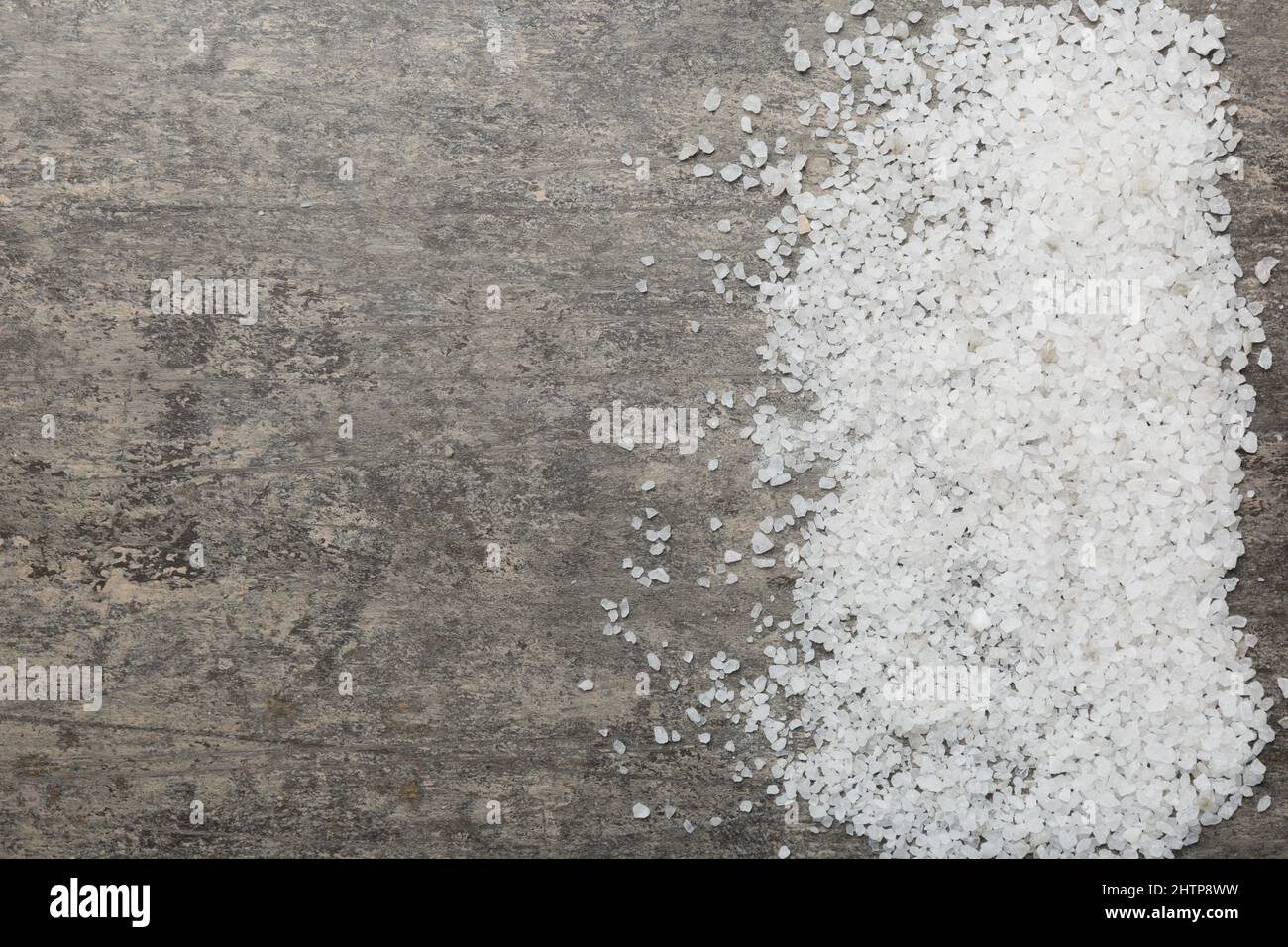 Background from white sea salt. Coarse rock salt texture witth copy ...