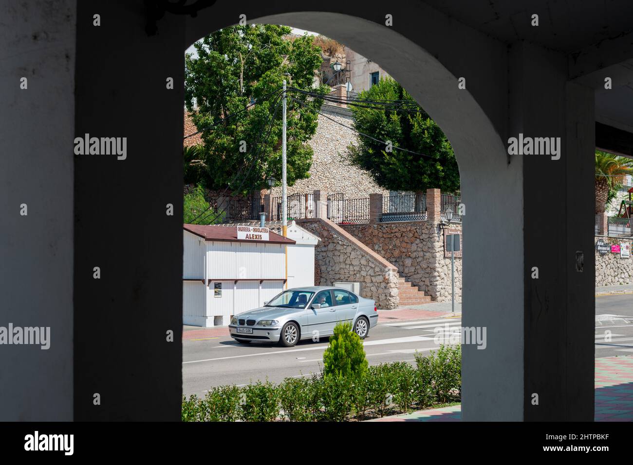View of a car behind a arch Stock Photo - Alamy