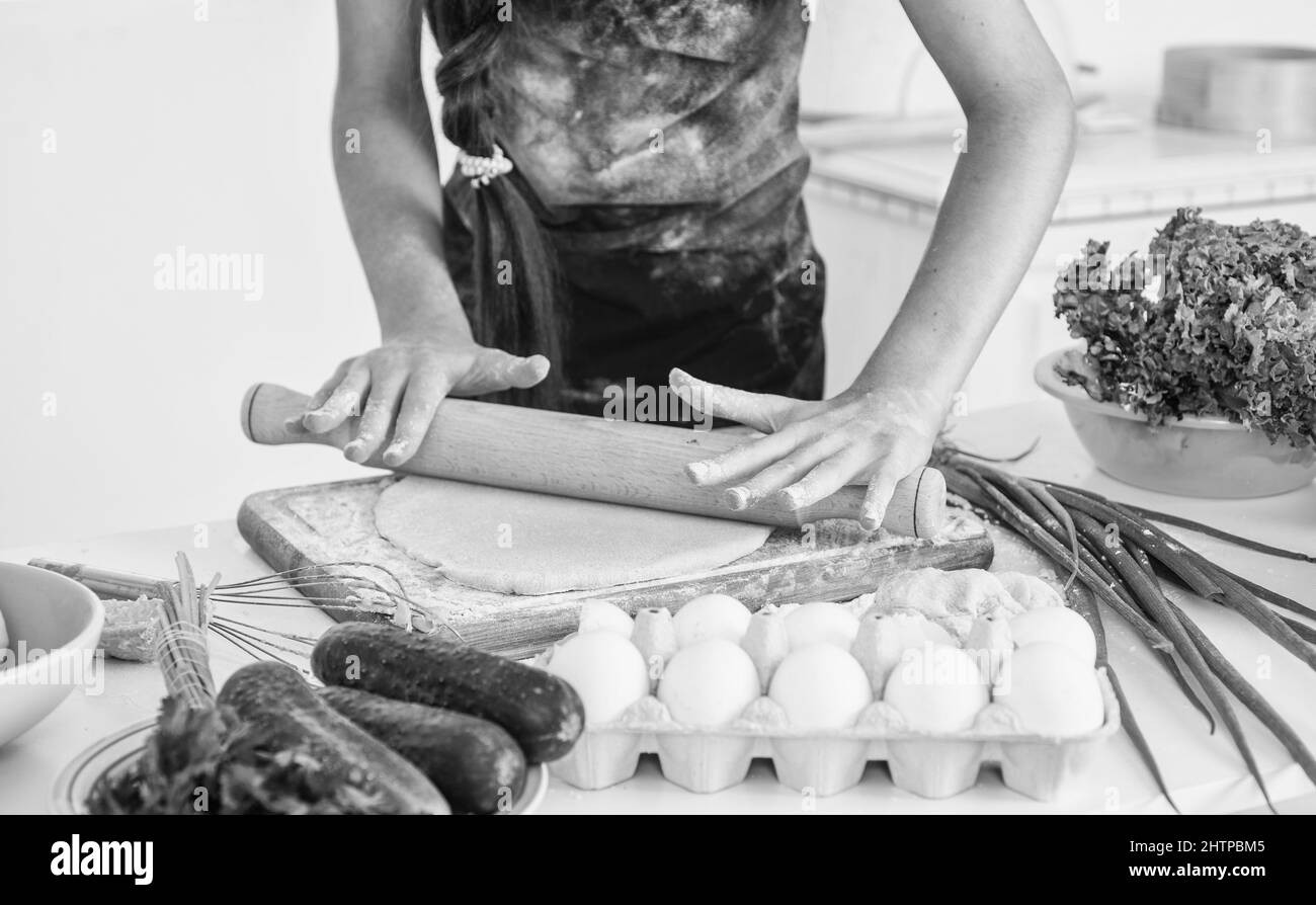 girl having fun while cooking, childhood Stock Photo - Alamy