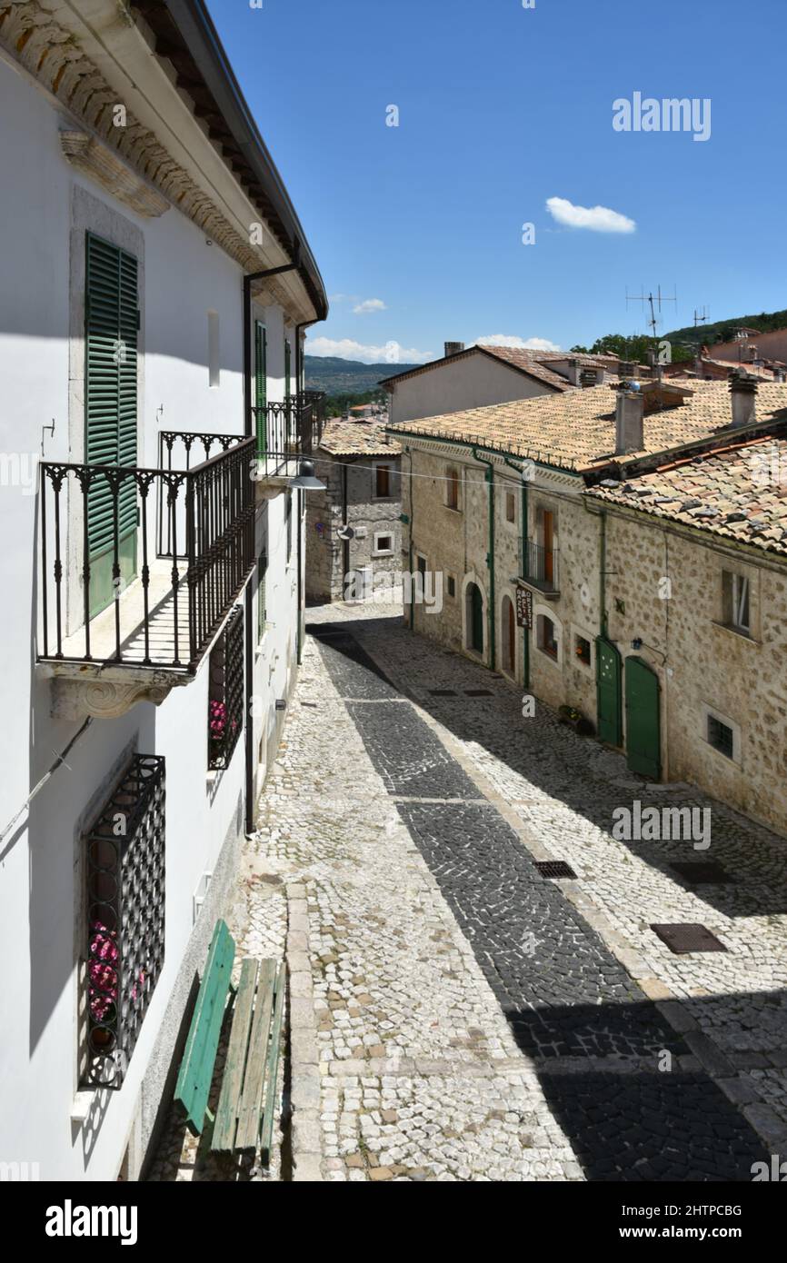 Narrow street among the old stone houses of Civitella Alfedena, a medieval village in the ...