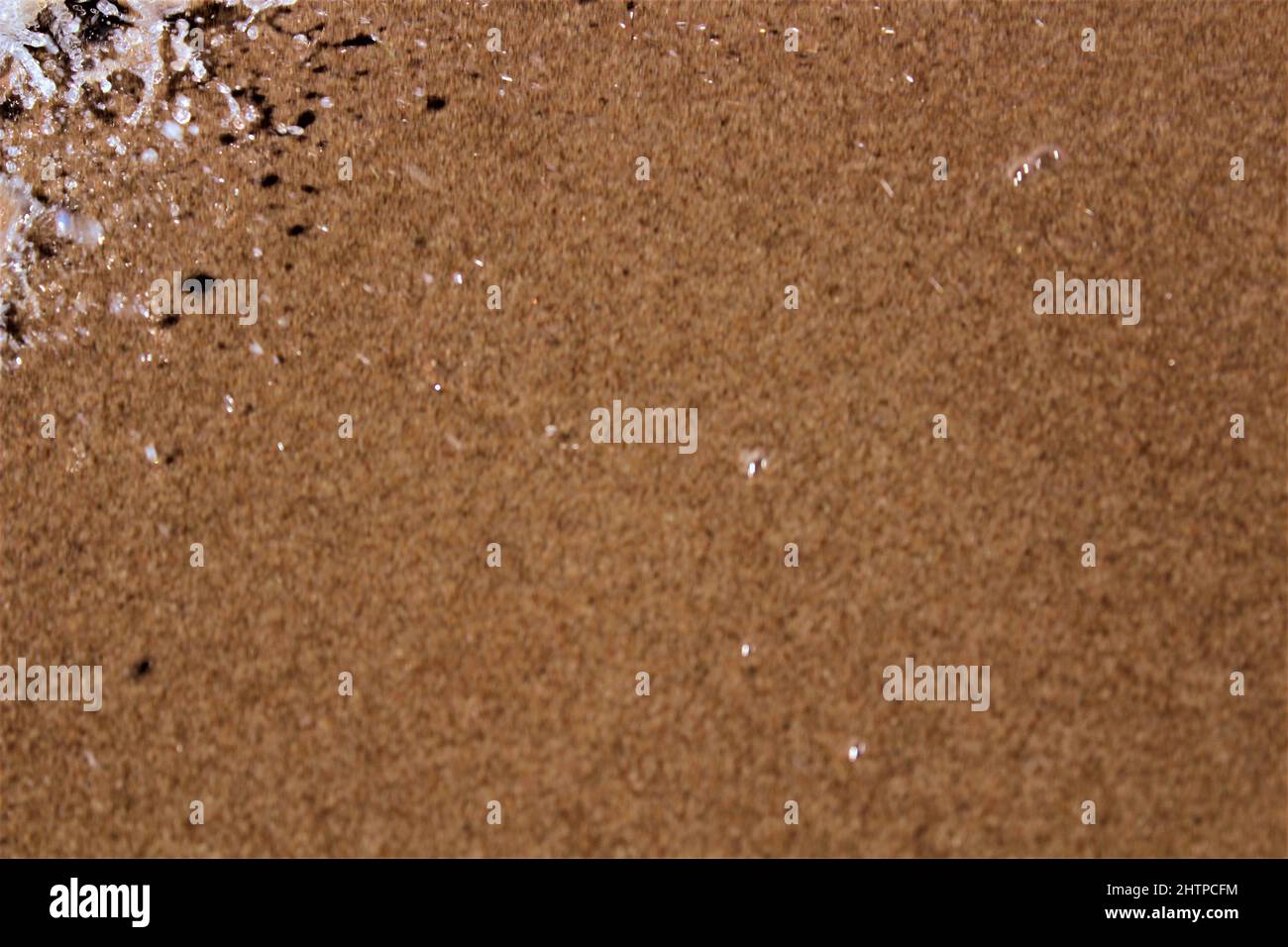 Shoreline sand water washing hi-res stock photography and images - Alamy