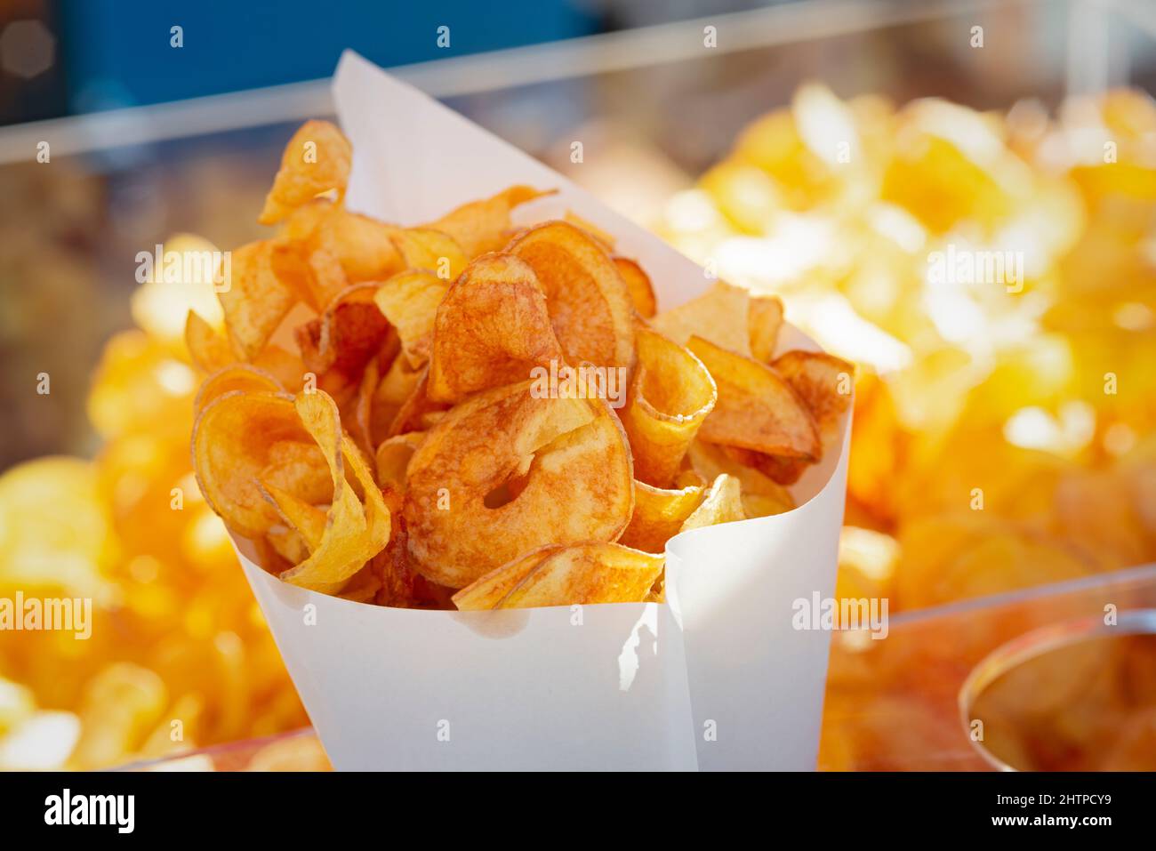 Fried Potato Chips in Paper Cornets for Sell at Market Stall Stock ...