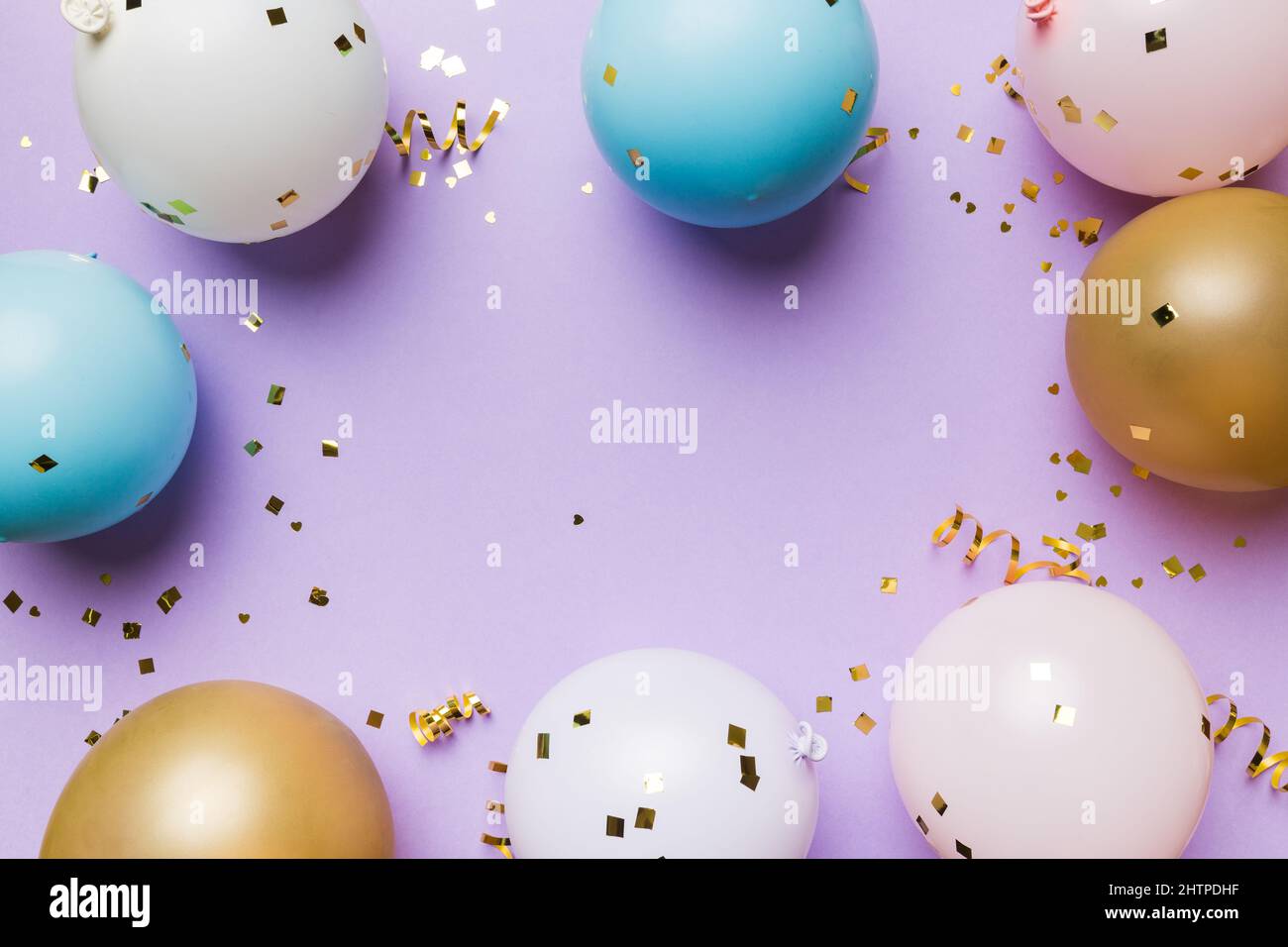 Flat lay party decoration concept on pastel colored background from ...