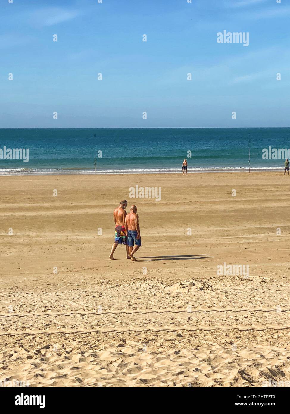 Two men walking together hi-res stock photography and images - Alamy