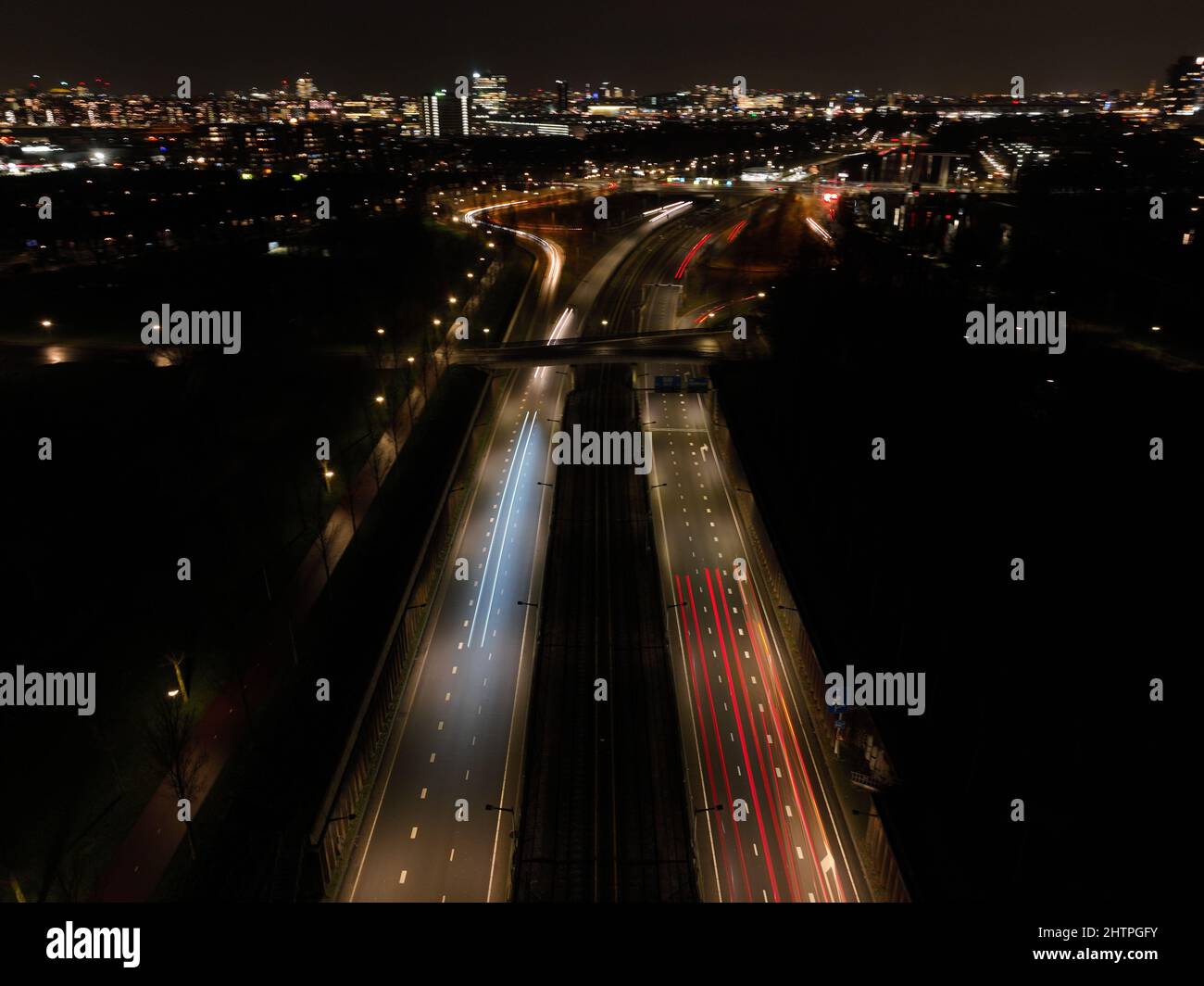 Amsterdam at night, dutch infrastructure road intersection, train, road ...