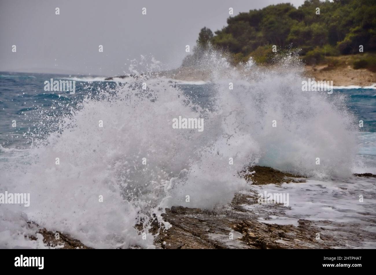 Big wave splash into croatian rocky beach during strong wind on ...