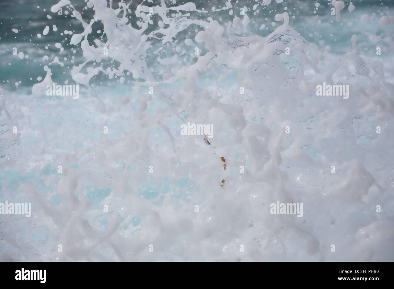 Wave crashing onto a beach hi-res stock photography and images - Alamy
