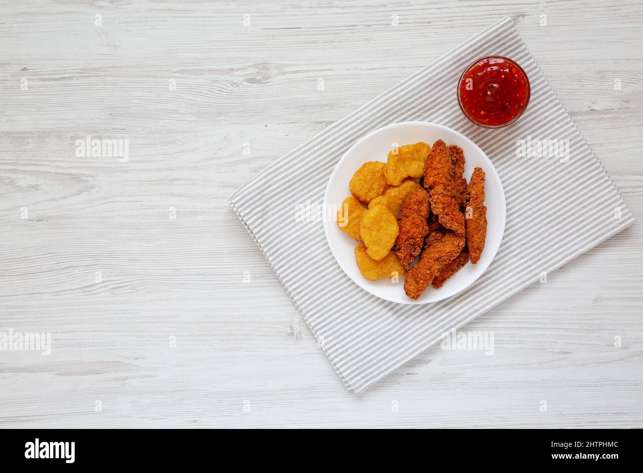 Homemade Nuggets and Chicken Tenders with Sweet and Sour Sauce, top ...