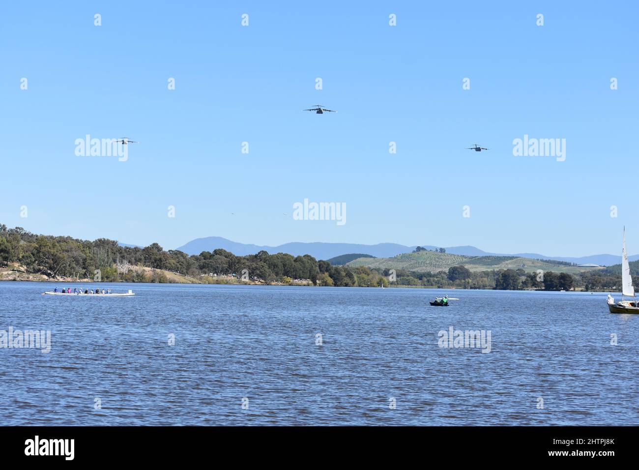 Three Royal Australian Air Force C-17 Globemasters flying in formation ...