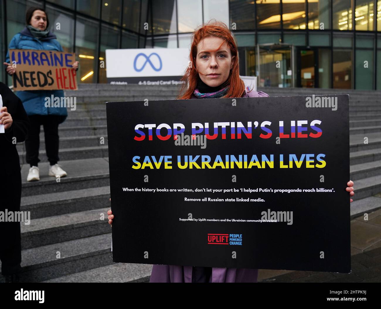 Layla Wade (right), a campaigner with Uplift, takes part in a protest ...