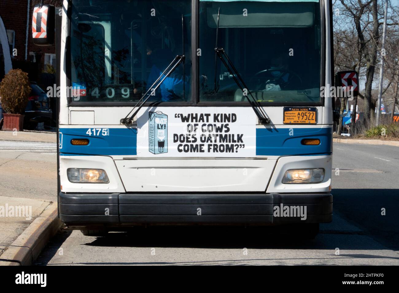 A quirky funny irreverent Oatly oat milk ad on the front of a New York ...