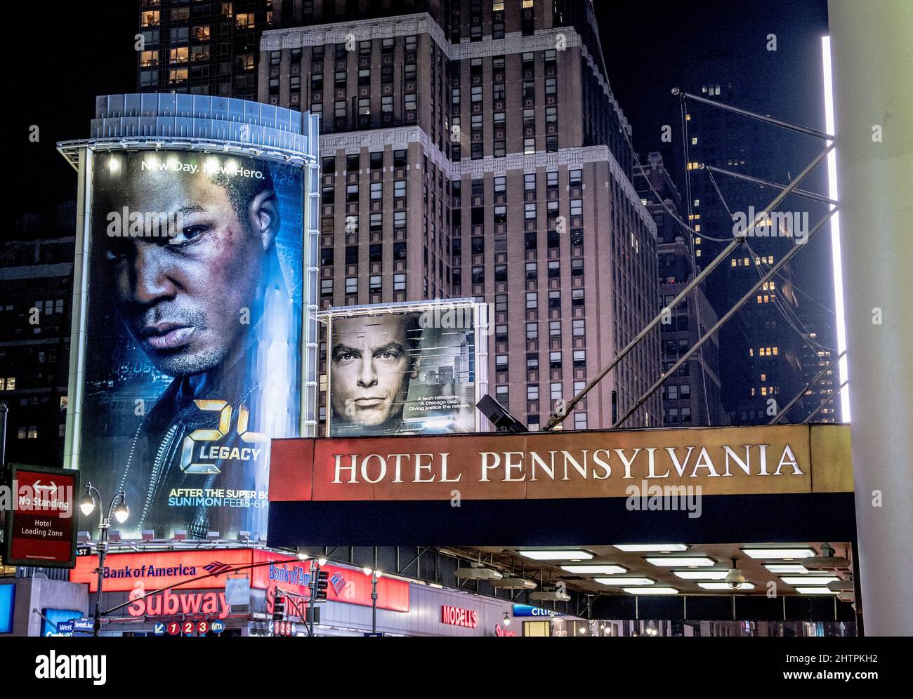 Illuminated billboards near Times Square and Hotel Pennsylvania in New ...