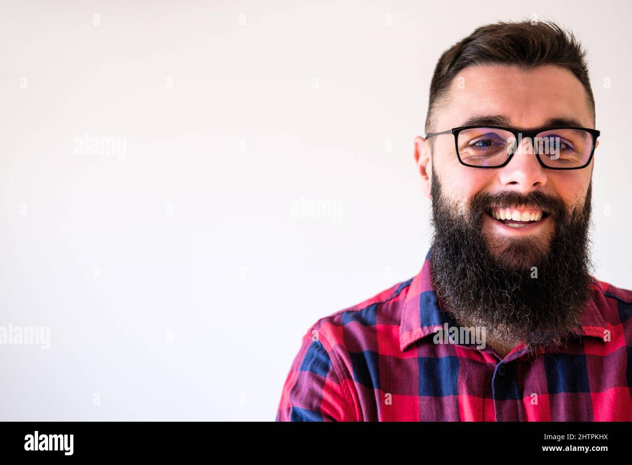 Portrait of happy man who is smiling. Copy space on image for your text ...
