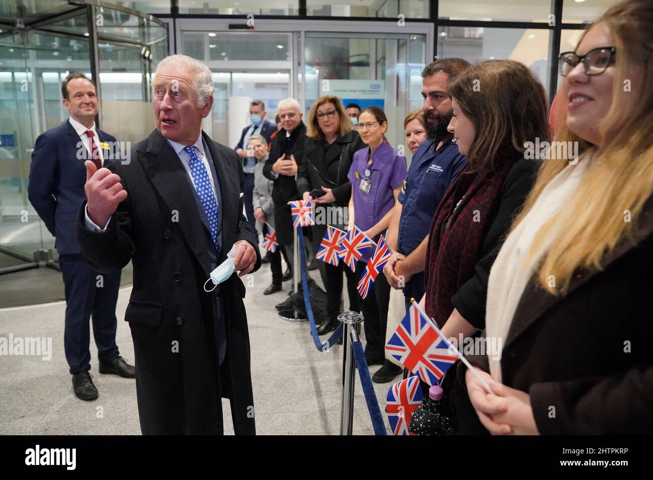 The Prince of Wales (left) meets staff during his visit to open the ...