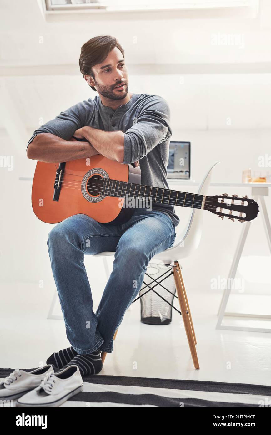 No music, no life. Know music, know life. Shot of a handsome young man ...