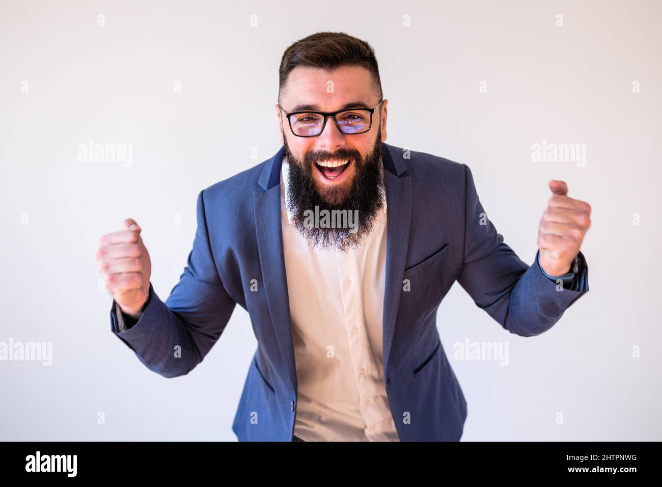 Portrait of ecstatic businessman. Copy space on image for your text or ...