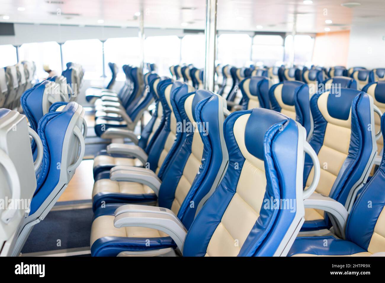 Ferry over ocean. Interior of a ship with empty passengers seats and ...