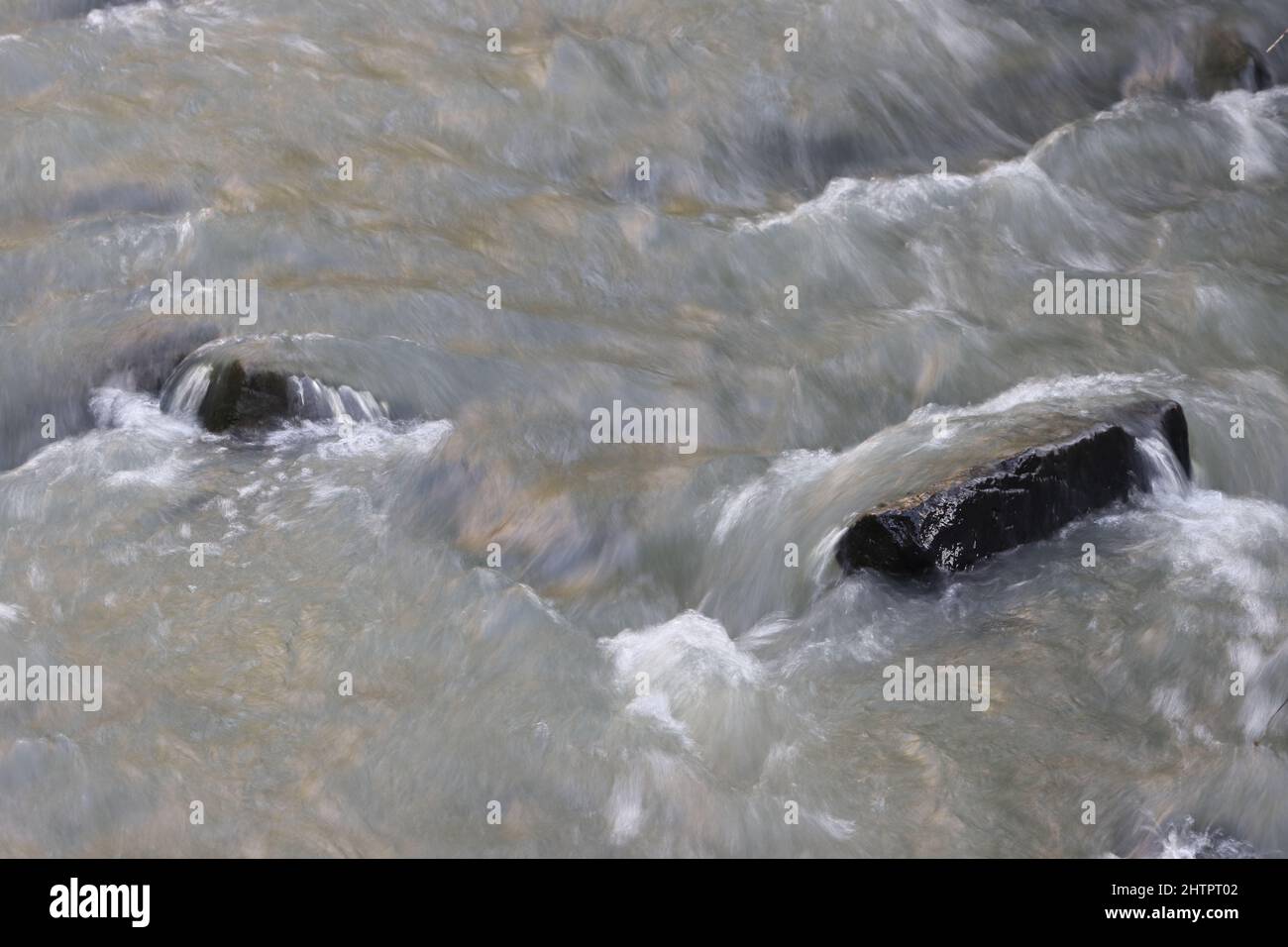 Fast moving water over rocks hi-res stock photography and images - Alamy