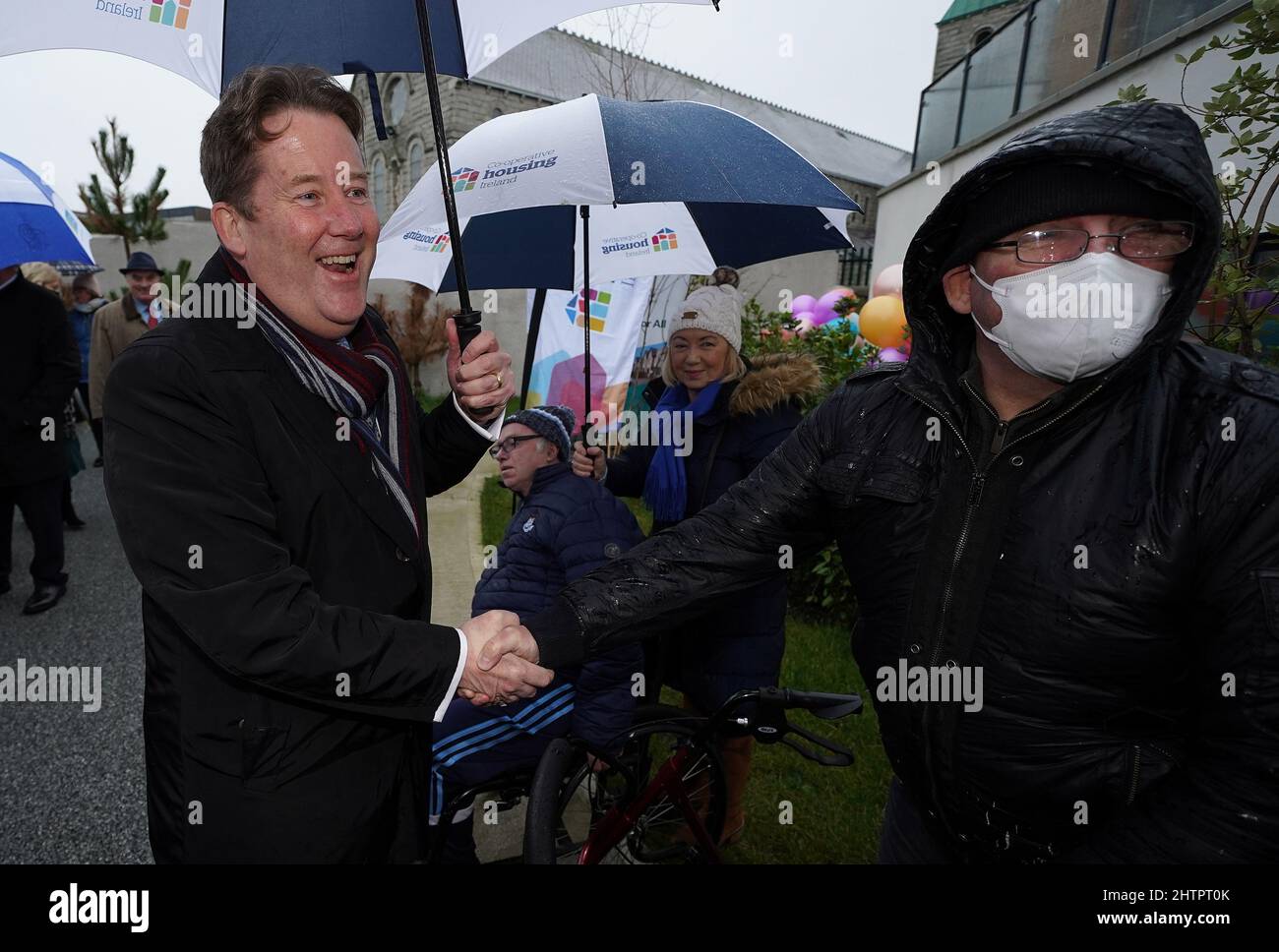 Minister for Housing Darragh O’Brien (left) shakes hands with resident ...