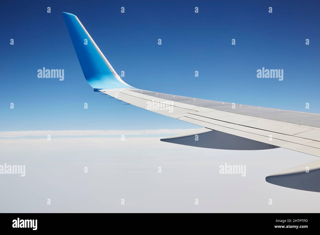 The wing of a passenger aircraft in flight Stock Photo - Alamy