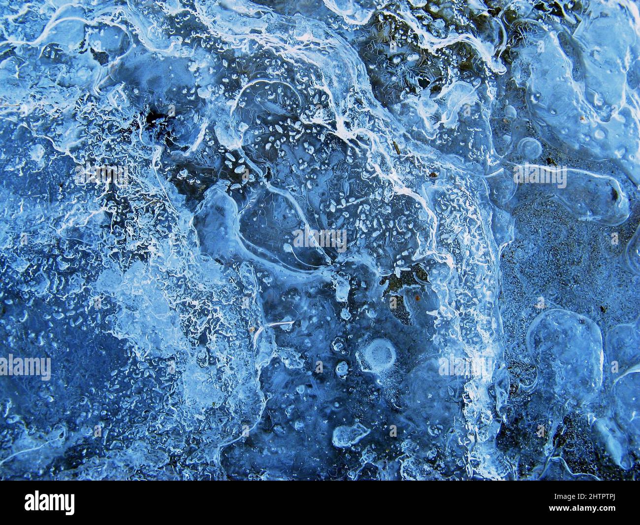Top view of a layer of vibrant blue frozen water ice Stock Photo - Alamy