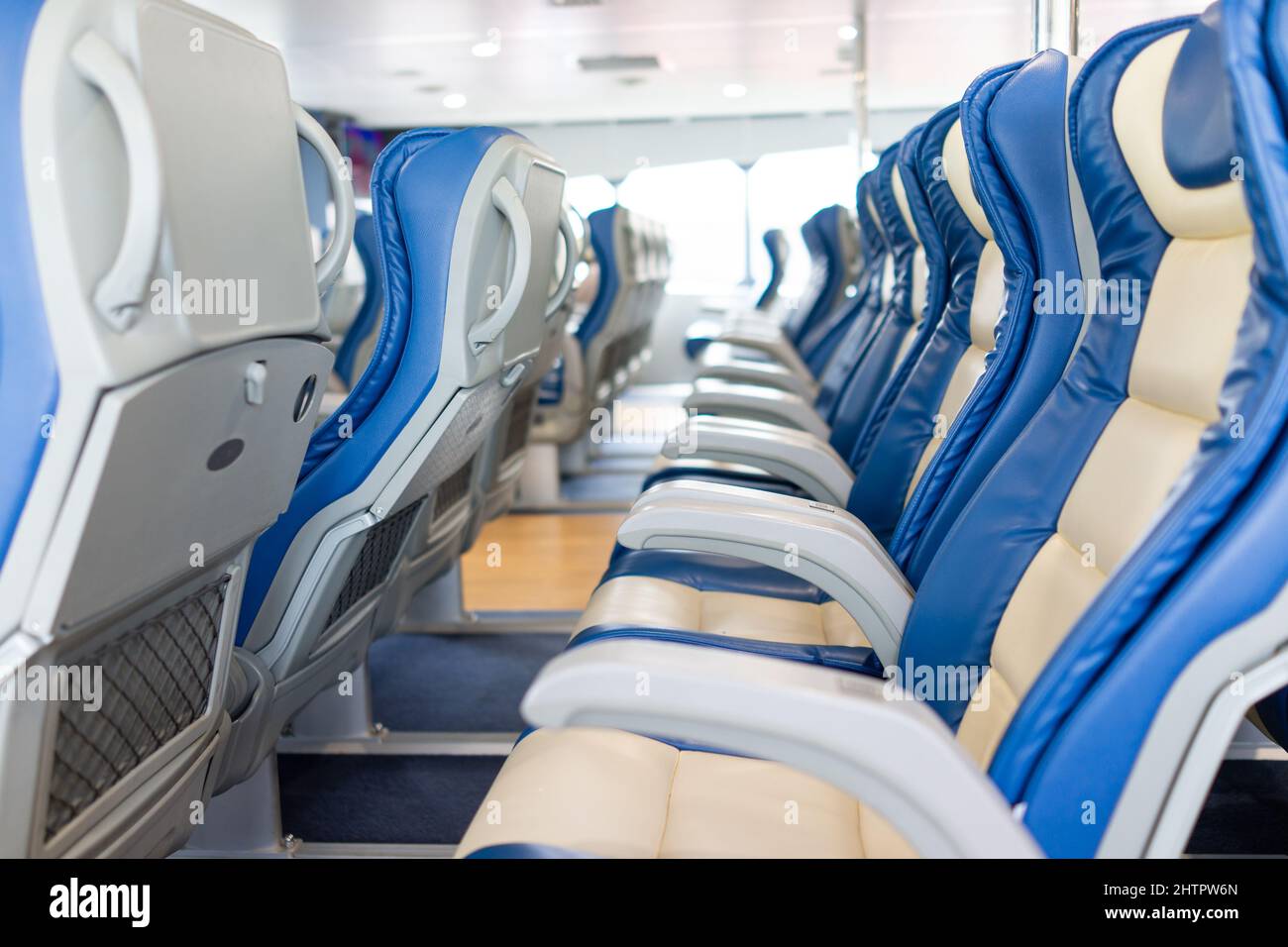 Ferry over ocean. Interior of a ship with empty passengers seats and ...