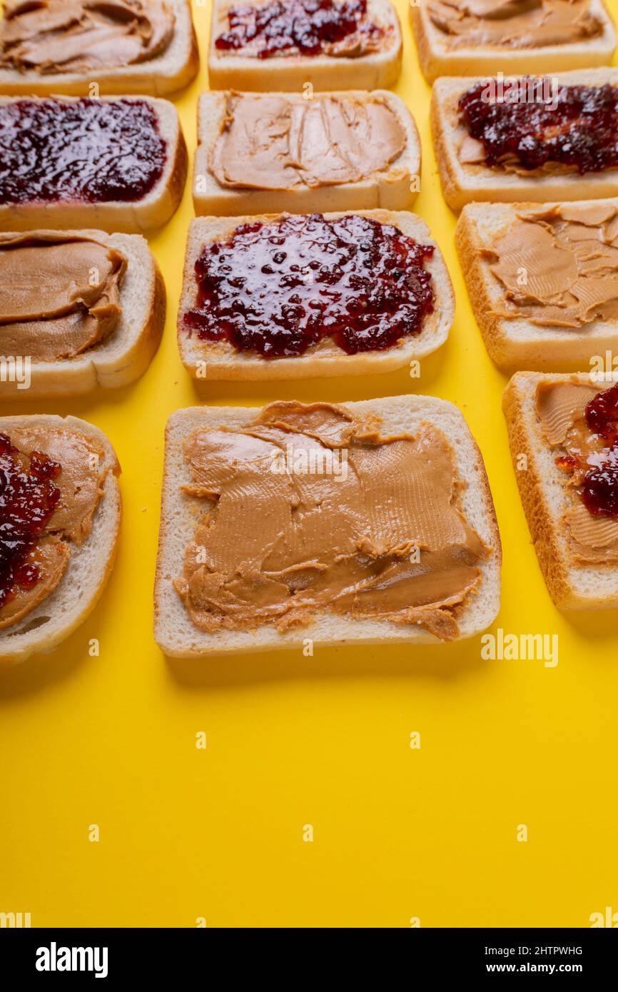 Full frame close-up shot of bread slices with preserves and peanut ...