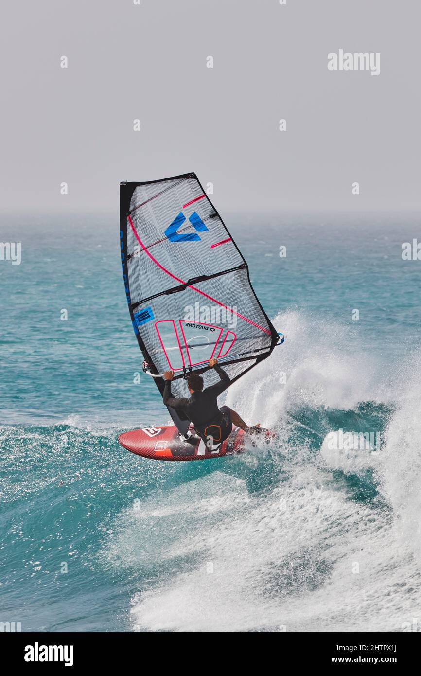 Wind-surfing down Atlantic waves at Ponta Preta, southwest coast of Sal ...