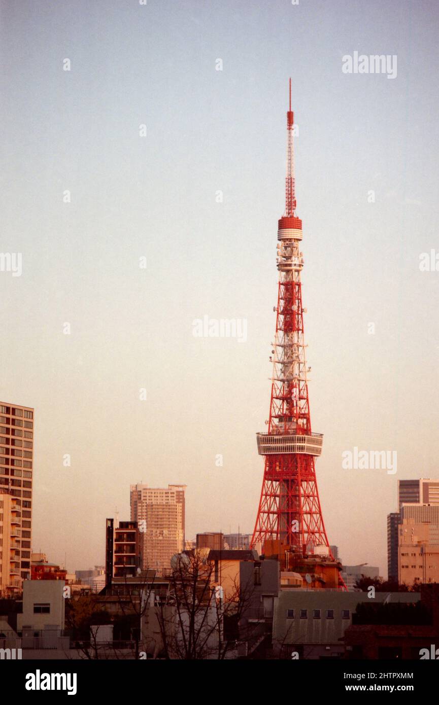Vertical shot of buildings of Tokyo and Tokyo Tower in Japan Stock ...