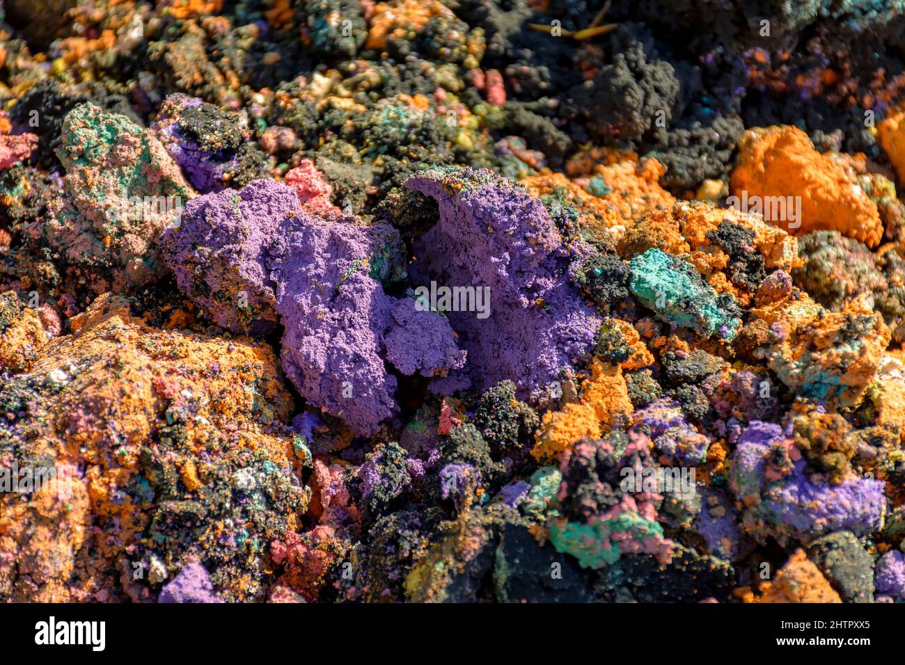 Multi-colored garbage on the ground Stock Photo - Alamy