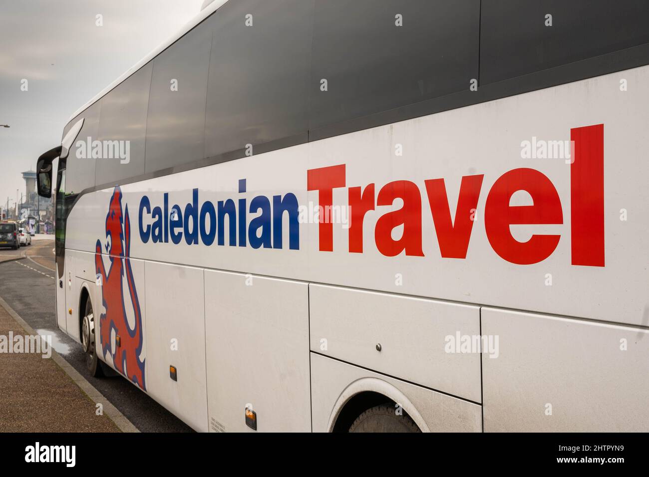 Caledonian Travel coach parked on side of road Stock Photo - Alamy