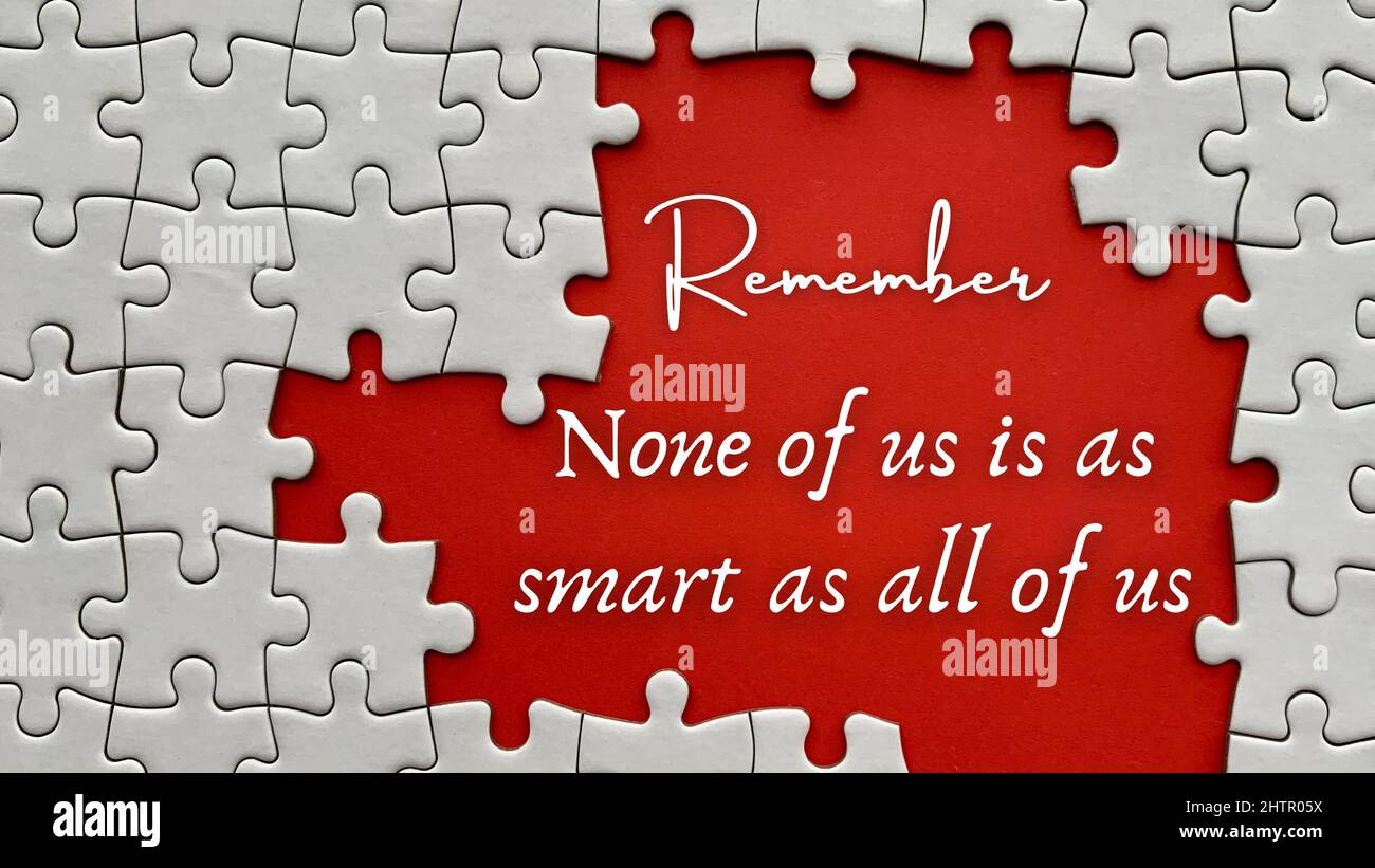 Motivational quote on red cover - None of us is as smart as all of us ...