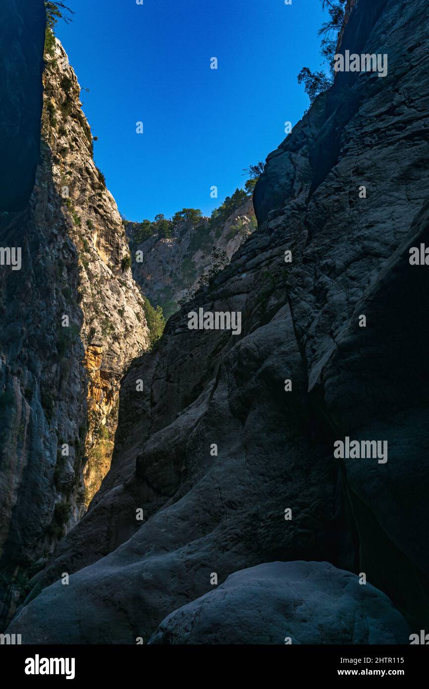 mountain landscape, view from the bottom of a deep canyon Stock Photo ...