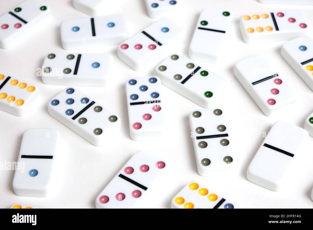 Dominoes with colorful coloring on a white background Stock Photo - Alamy