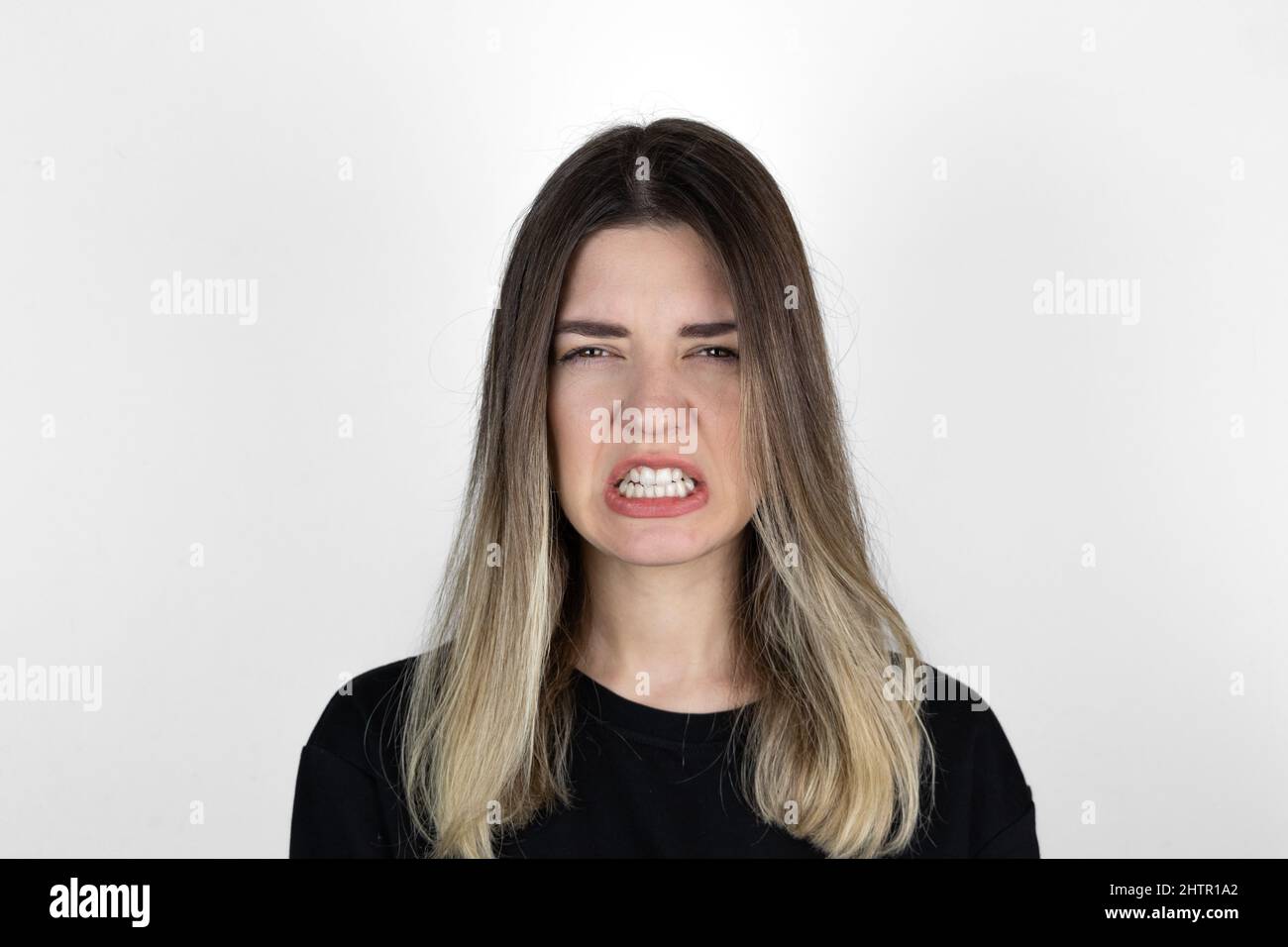 Angry girl screaming. White background. Lifestyle, emotions and ...