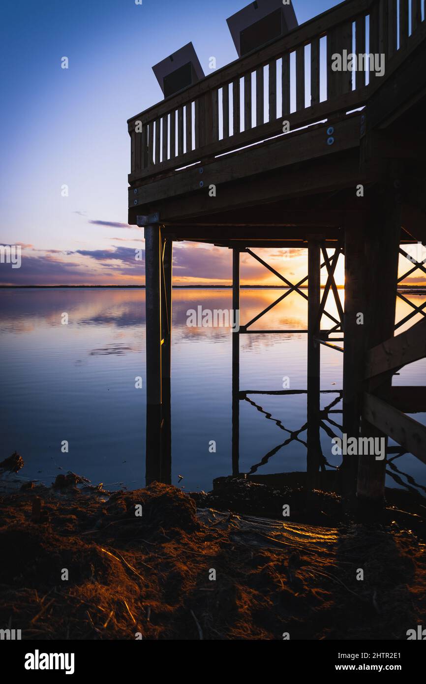 Elevated platform facing the sea on the sunset Stock Photo - Alamy