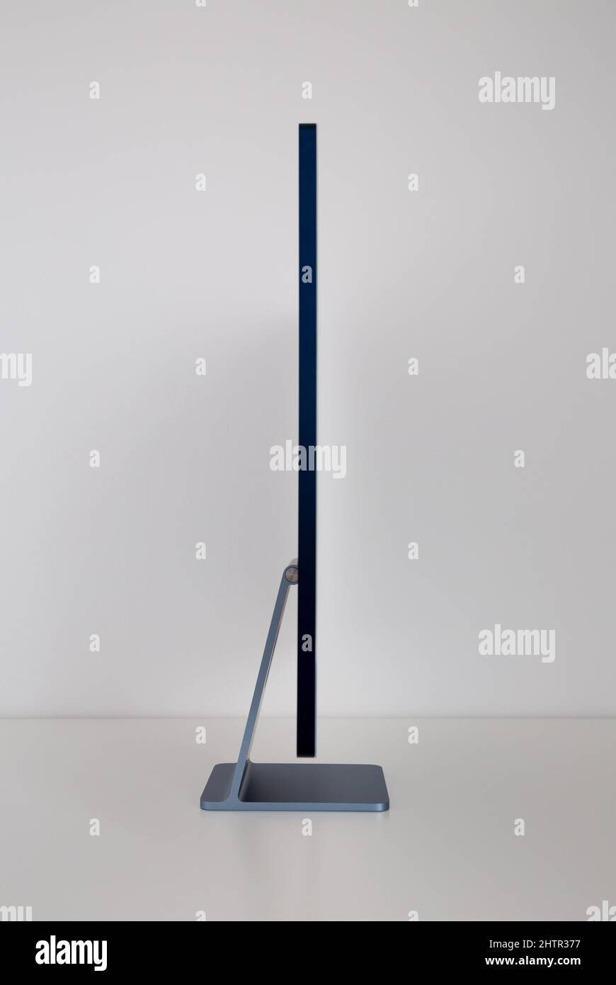 Desktop computer on the table, side view Stock Photo - Alamy