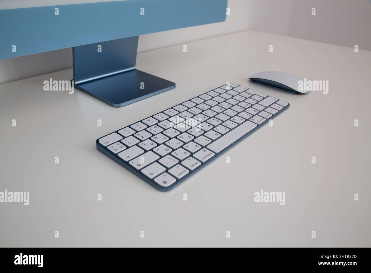 Desktop computer with wireless keyboard and mouse. New model multicolored Apple iMac Stock Photo ...