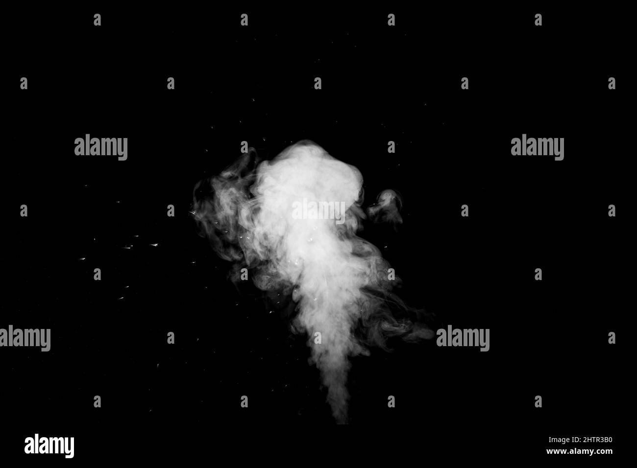 Curly white steam rising up and splashing water scattering in different ...