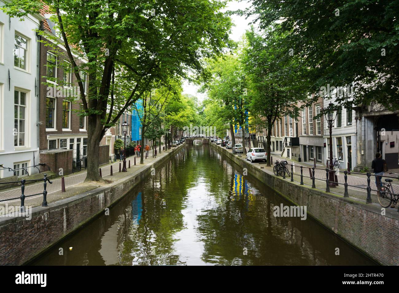River surrounded by buildings and trees in the city Stock Photo - Alamy