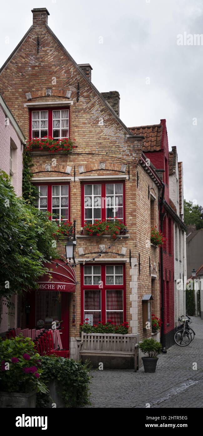 Vertical shot of an old european apartment building with a triangle ...