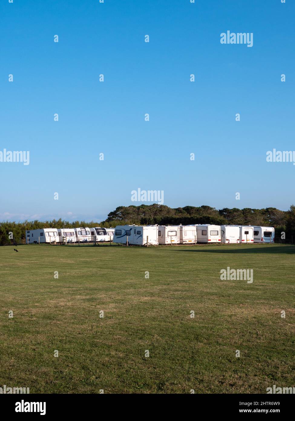 Caravans in storage in a field on a camp site in Cornwall UK Stock ...