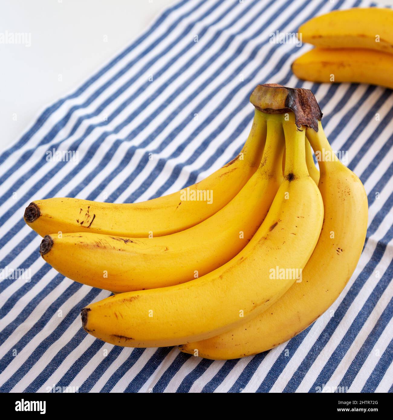 Raw Organic Bananas on cloth, side view Stock Photo - Alamy