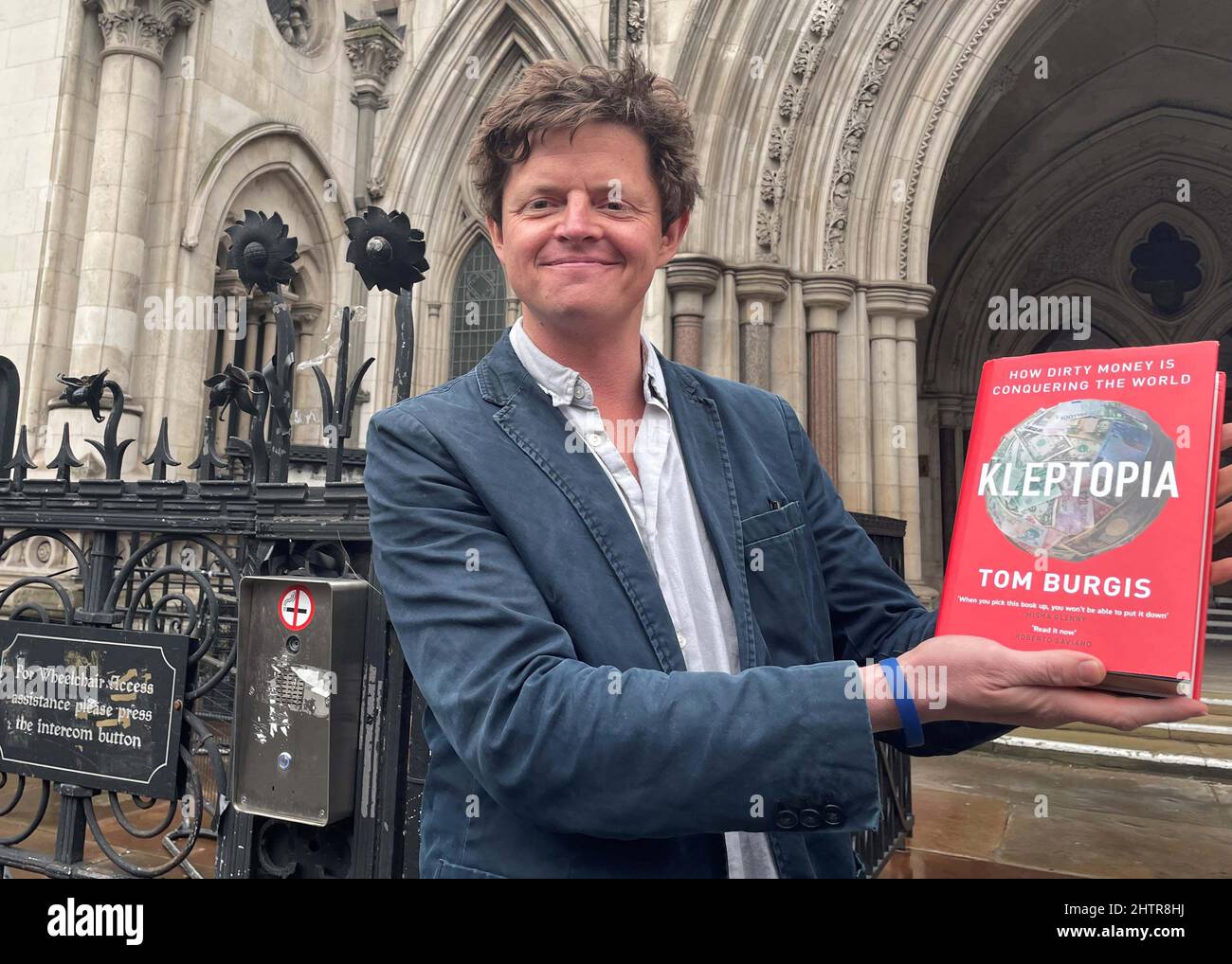 Tom Burgis outside of the Royal Courts of Justice in London after a ...