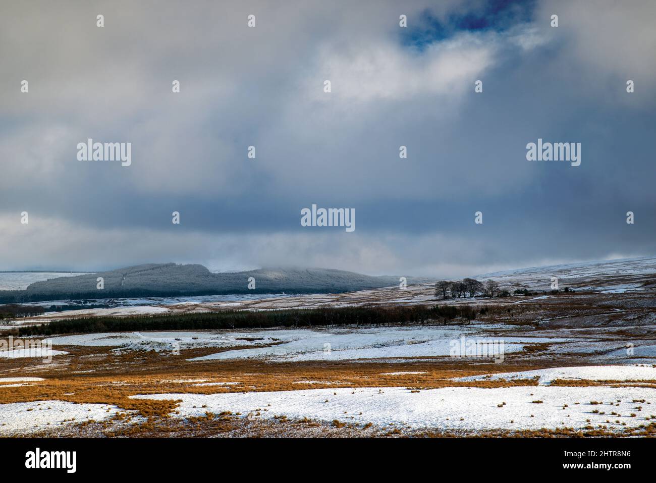A winter scene looking over the snow covered moors to Dungavel Hill ...