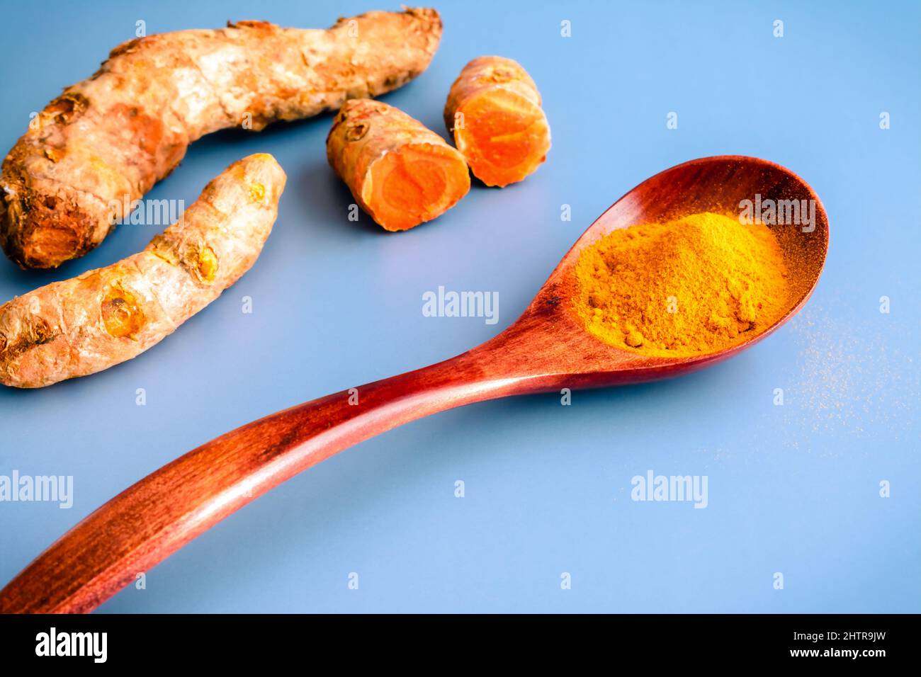 Ground Turmeric with Fresh Turmeric Root: A spoonful of ground turmeric ...