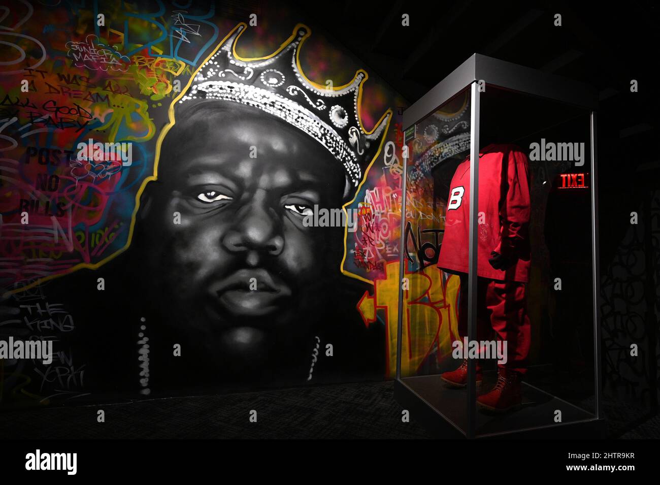 A portrait and red suit from Brooklyn native rapper Notorious B.I.G ...