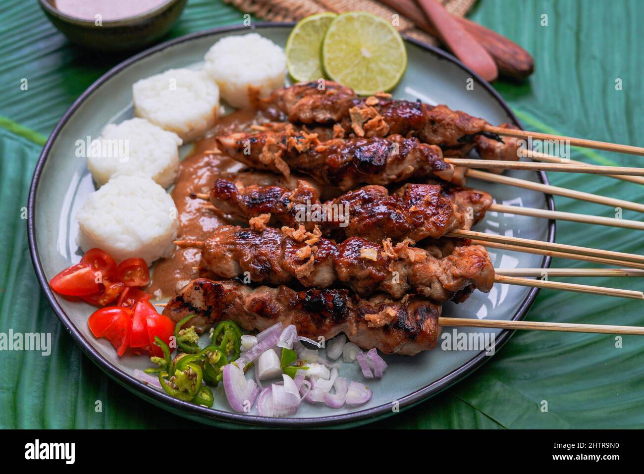 Indonesian famous food : sate ayam (chicken satay) , served with peanut ...