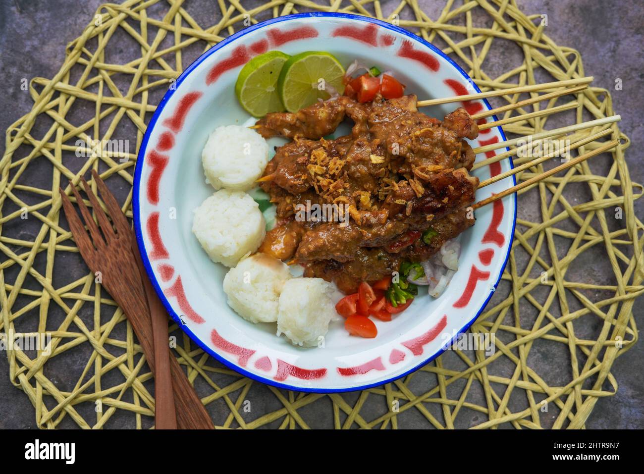 Indonesian famous food : sate ayam (chicken satay) , served with peanut ...