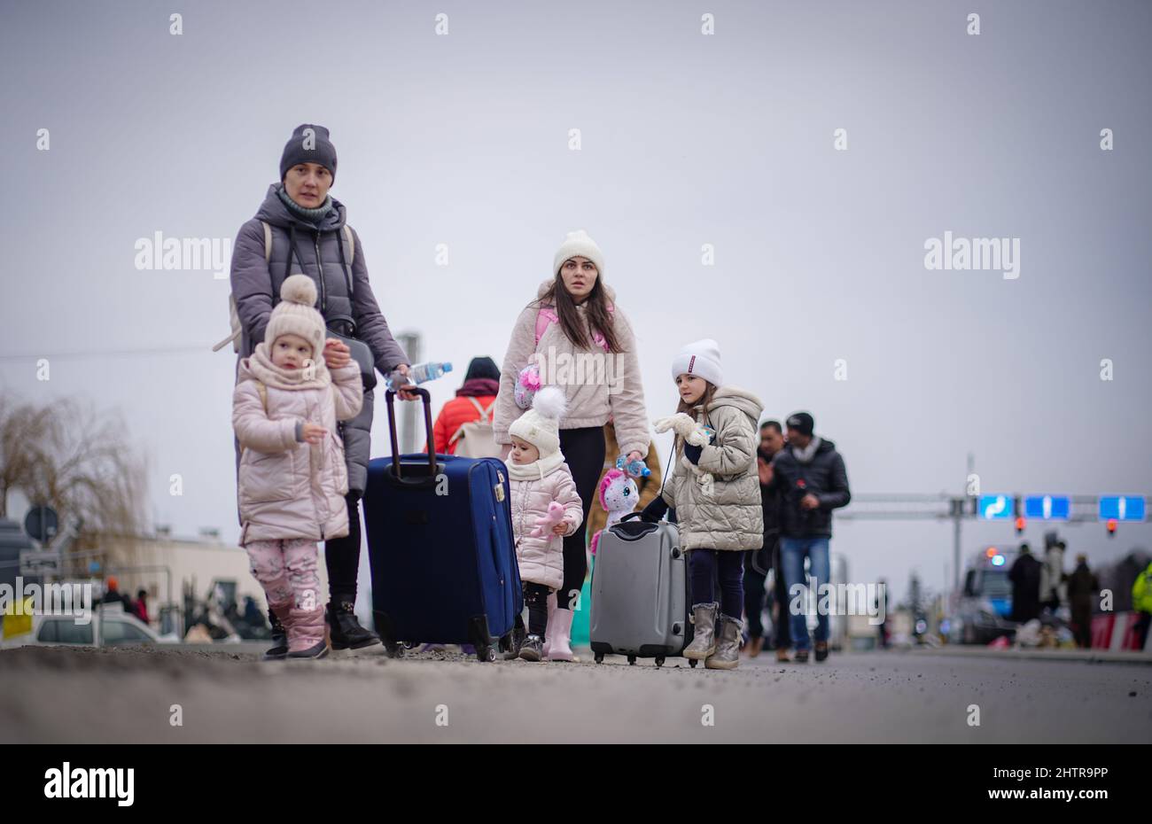 Medyka, Poland. 02nd Mar, 2022. Two sisters cross the Ukrainian-Polish ...